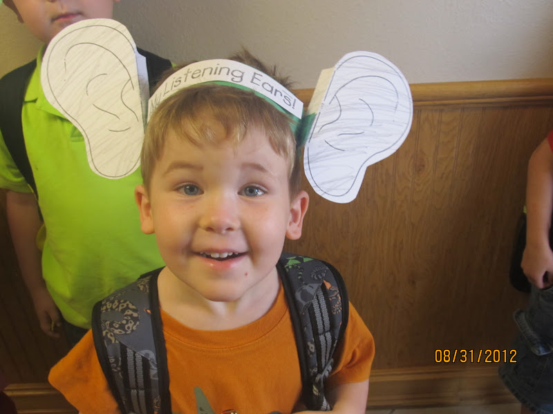 Queen of 4's: Listening Ears and Scenes from a Pre-k 4 Classroom